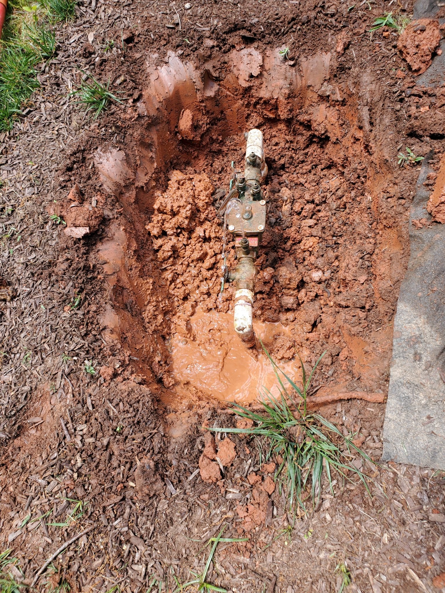 old underground backflow dug up | Doctor Sprinkler