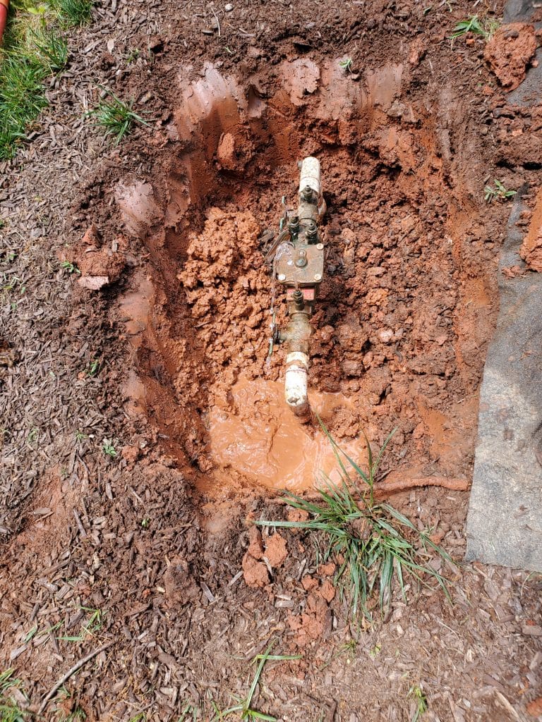 old underground backflow dug up | Doctor Sprinkler